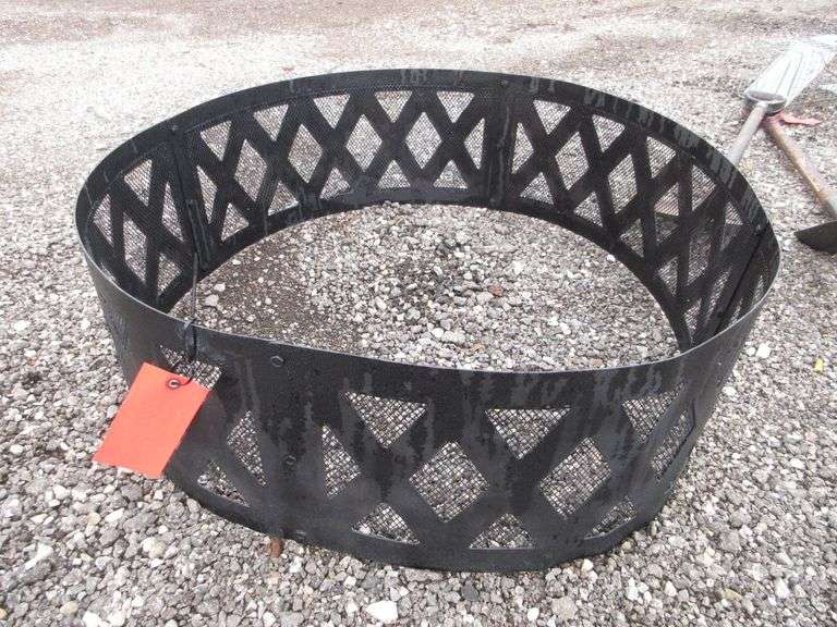 Large outside fire ring, heavy metal, has wear, 36"Dia x 12"H, in good ...