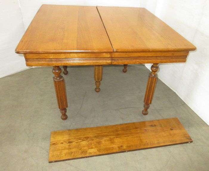 Antique oak square kitchen table, 42", has five legs, and one leaf ...