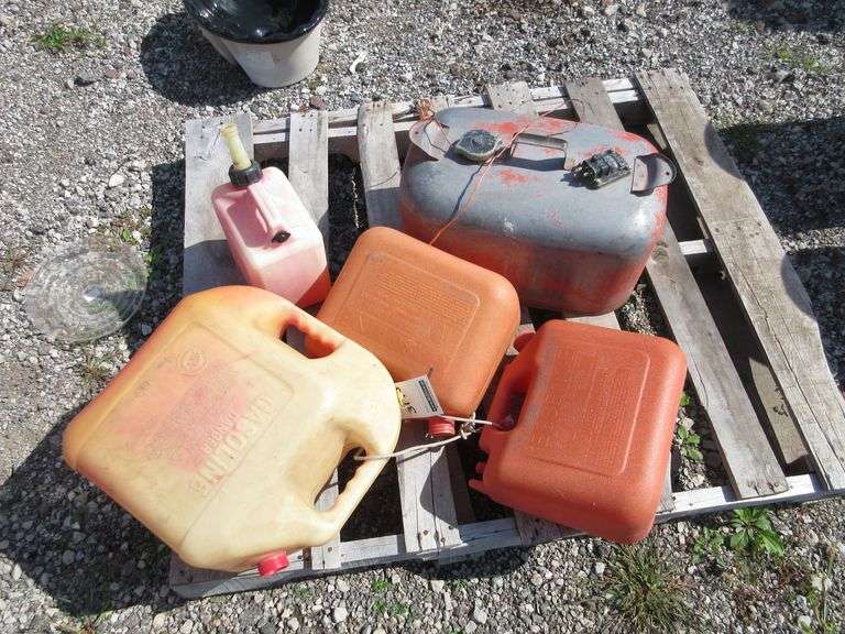 (2) 2-gallon gas cans, 5-gallon gas can, and 1.5-gallon metal boat gas ...