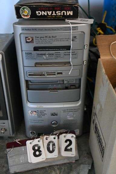 Tower Computer with Collection of Cords and Chargers - Apexx Auctions