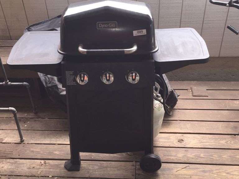 Dyno Glo Grill w/Propane Tank - Assiter Auctioneers
