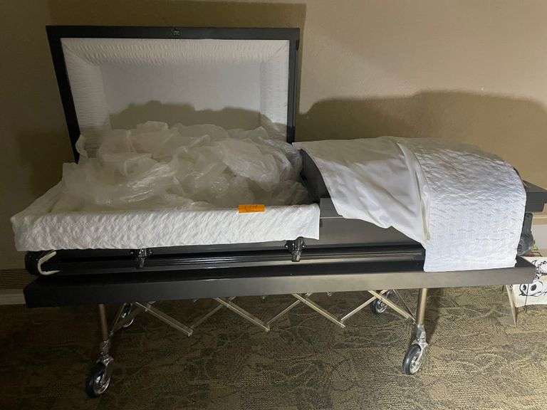 Baron Casket with Wheels - Assiter Auctioneers