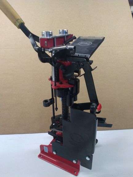 MEC 9000 Series press with books - Baer Auctioneers - Realty, LLC