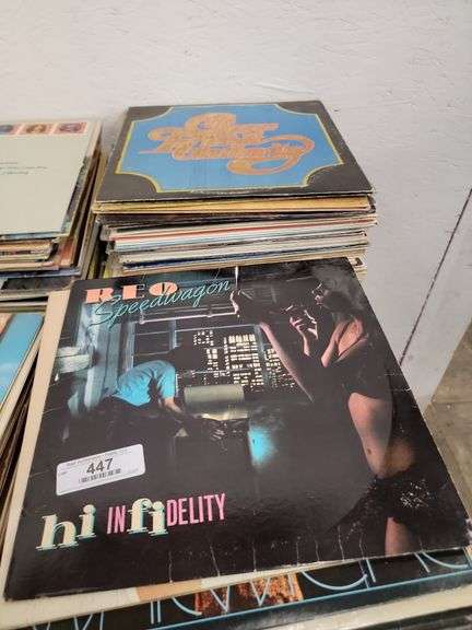 2 Stacks Of Albums - Baer Auctioneers - Realty, LLC