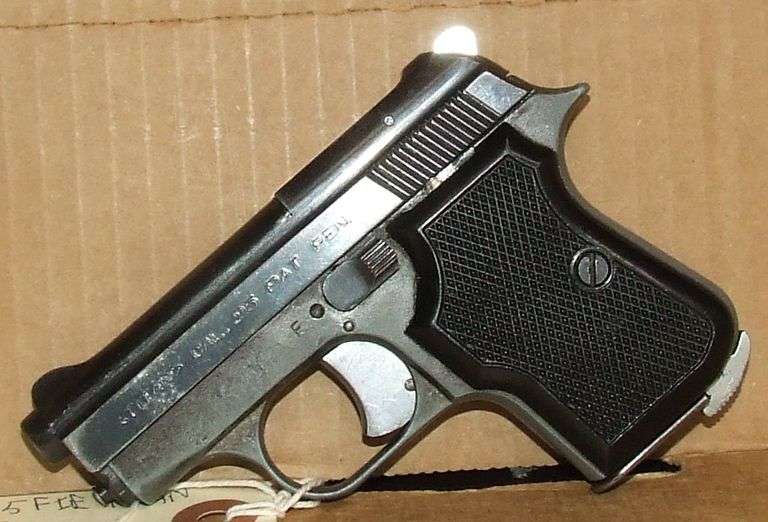 FIE Titan 25 Auto Pistol - Baer Auctioneers - Realty, LLC