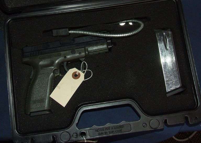 Springfield XP40 40 S&W Pistol - Baer Auctioneers - Realty, LLC