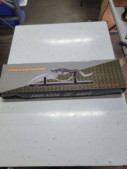 Emblazon of Knife - Baer Auctioneers - Realty, LLC