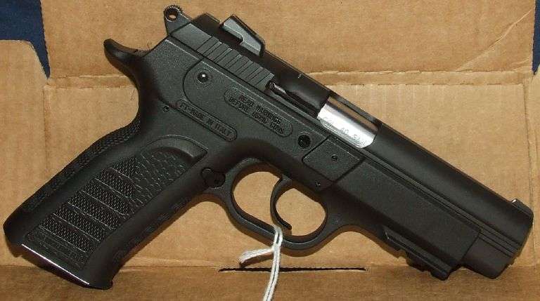 EAA Tangfolio Witness 40 S&W Pistol - Baer Auctioneers - Realty, LLC
