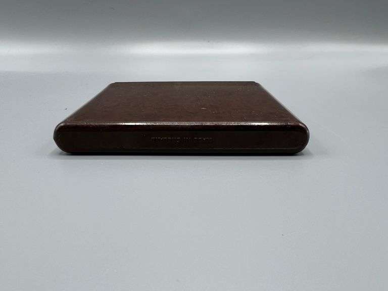 Spring Loaded WWII Era Bakelite Cigarette Case - Baer Auctioneers ...