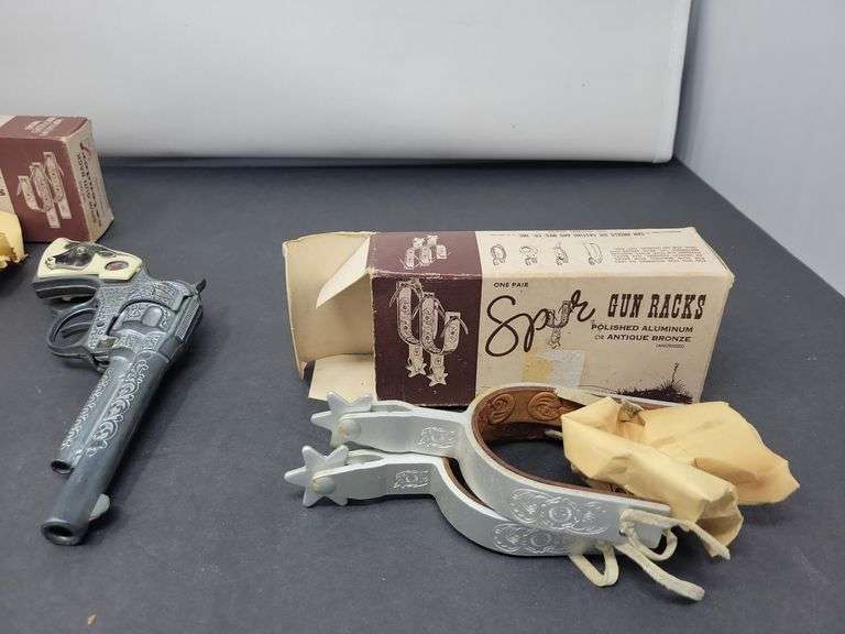 Texan Jr. Cap Gun, Spurs, And Gun Rack - Baer Auctioneers - Realty, LLC