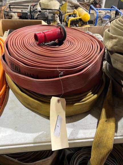 3 Bundles of Rubber Fire Hose - Baer Auctioneers - Realty, LLC