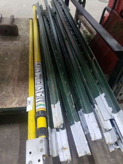 Fence Posts and Large Measuring Stick - Baer Auctioneers - Realty, LLC