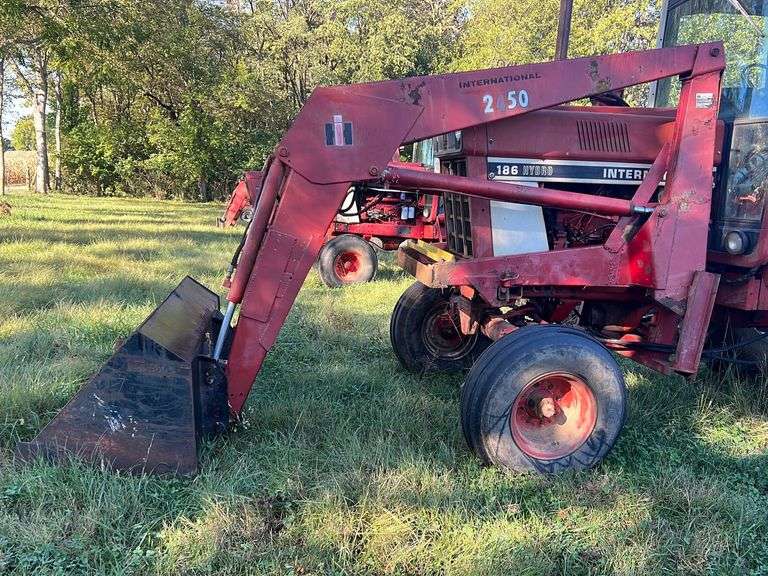 International 2450 Loader Attachment - Baker Auctions & Real Estate, LLC