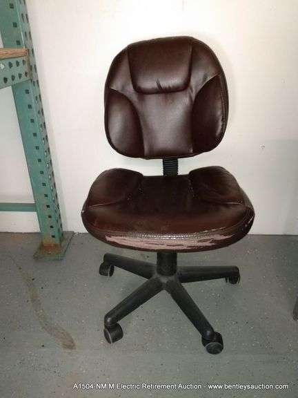 BROWN LEATHER CASTERED OFFICE CHAIR - Bentley & Associates, LLC