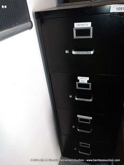 BLACK 4 DRAWER FILE CABINET - Bentley & Associates, LLC