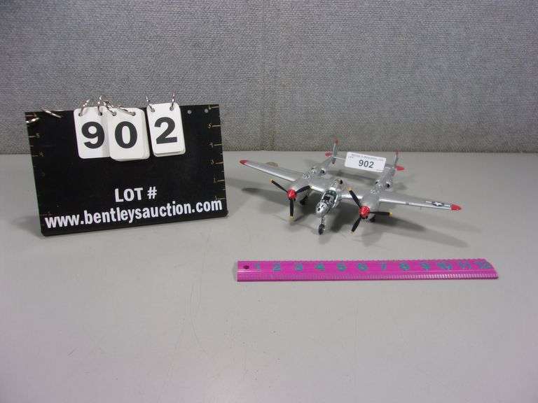 BLUE MODEL AIRPLANE - **DAMAGED** - Bentley & Associates, LLC