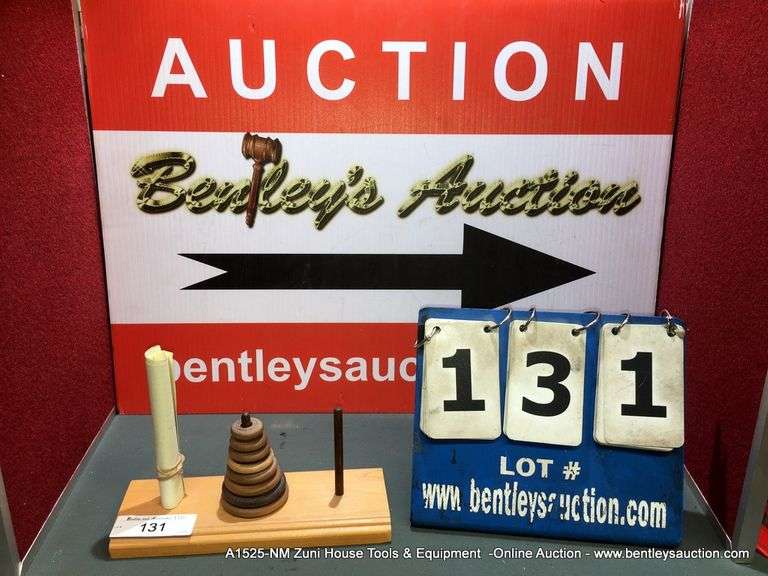 WOODEN DISK STACK PUZZLE GAME - Bentley & Associates, LLC