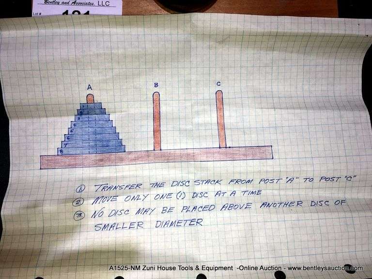 WOODEN DISK STACK PUZZLE GAME - Bentley & Associates, LLC