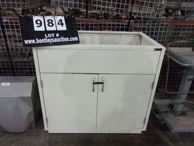 KEWAUNEE BEIGE METAL 2-DOOR LAB CABINET - Bentley & Associates, LLC