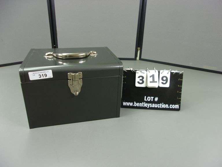GRAY METAL LOCK STORAGE BOX - Bentley & Associates, LLC