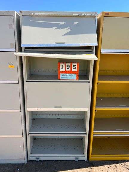 5-DRAWER CABINET - USED, AS IS, WEATHER DAMAGED - Bentley & Associates, LLC