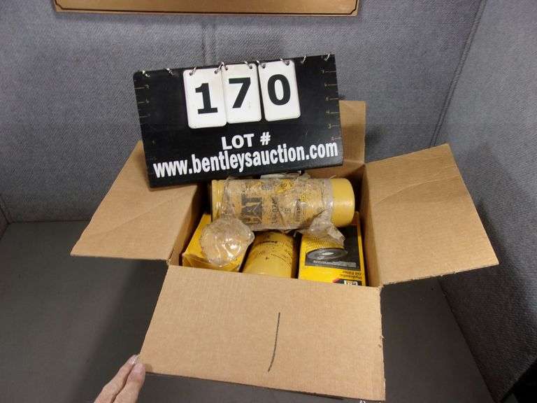 ASSORTED BOX OF CAT FILTERS - Bentley & Associates, LLC