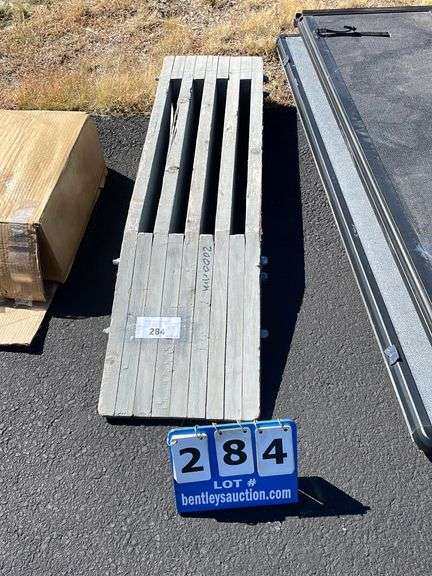 WEATHERED WOODEN WEDGE BLOCK RAMP - Bentley & Associates, LLC