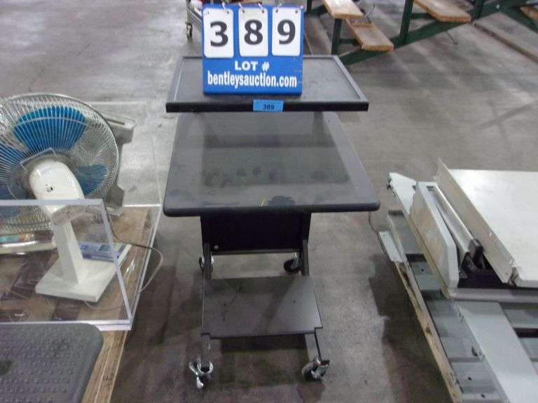 SMALL BLACK METAL FRAMED CASTERED TYPING STAND - Bentley & Associates, LLC