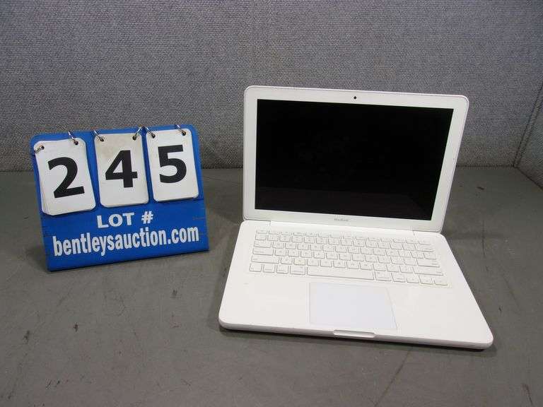 WHITE APPLE MACBOOK LAPTOP - Bentley & Associates, LLC
