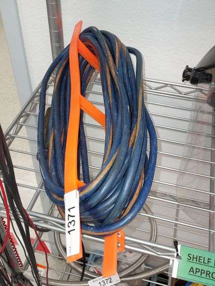 BLUE EXTENSION CORD W/ RACK - Bentley & Associates, LLC