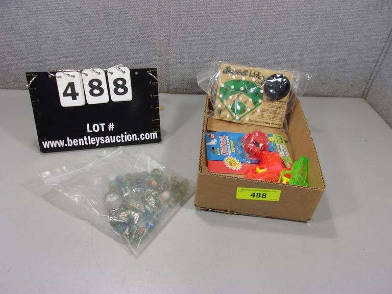 BOX: OLD GLASS CAT EYE MARBLES, BASEBALL GAME, WATER PISTOLS - Bentley ...