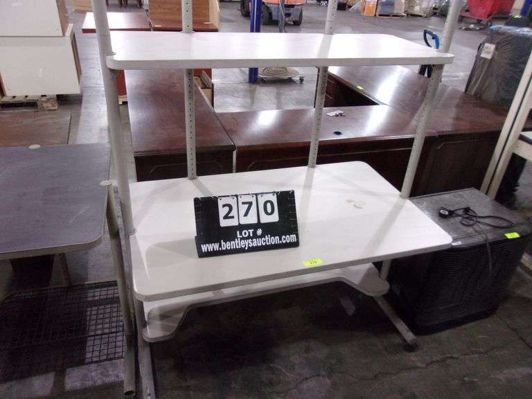 BEIGE CASTERED ANTHRO COMPUTER WORKSTATION - Bentley & Associates, LLC