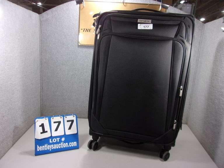 SAMSONITE LARGE SUITCASE - Bentley & Associates, LLC