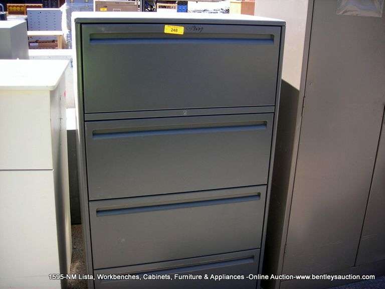 METAL 4-DRAWER CABINET - Bentley & Associates, LLC