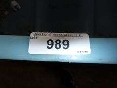 BLUE PLASTIC 4 WHEEL SOILED LINEN CART - Bentley & Associates, LLC