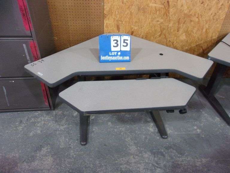 ADJUSTABLE TOP COMPUTER CORNER DESK - Bentley & Associates, LLC
