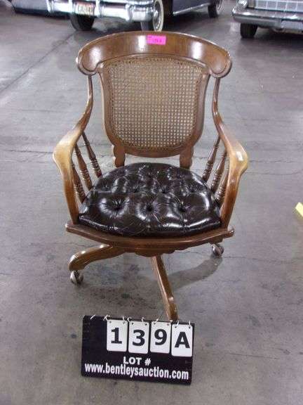 BURLED WALNUT CANE BACK CASTERED OFFICE CHAIR - Bentley & Associates, LLC