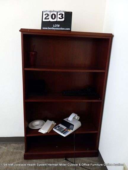 RED WOOD BOOKSHELF - Bentley & Associates, LLC