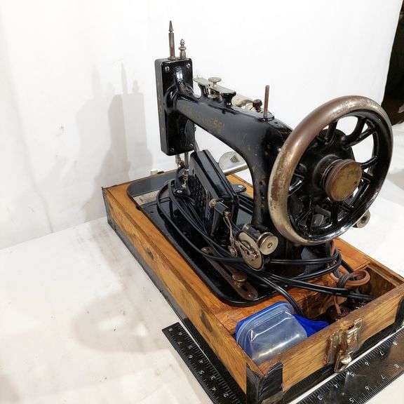VINTAGE SEAMSTRESS SEWING MACHINE - Bentley & Associates, LLC