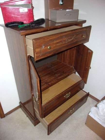 DARK BROWN CHEST OF DRAWERS - Bentley & Associates, LLC