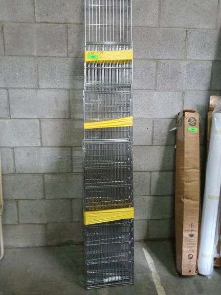 SEVEN PIECES OF SILVER RACKS FOR SHELVING - Bentley & Associates, LLC