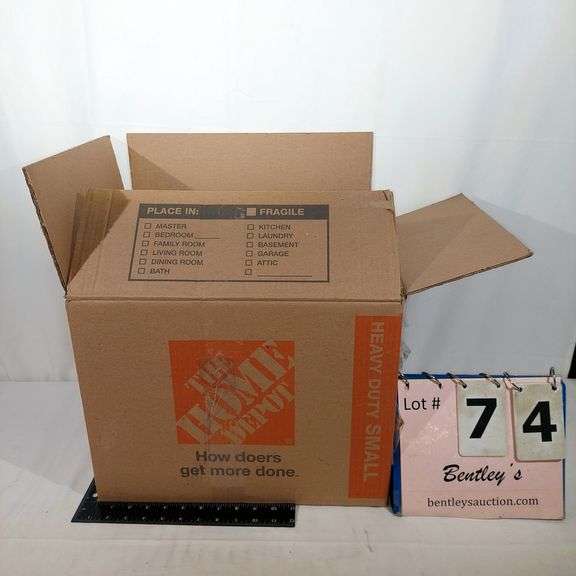 THE HOME DEPOT BOX W/ MOVIE DISKS - Bentley & Associates, LLC