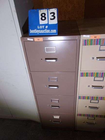 METAL 4-DRAWER FILING CABINET - DARK BROWN - Bentley & Associates, LLC