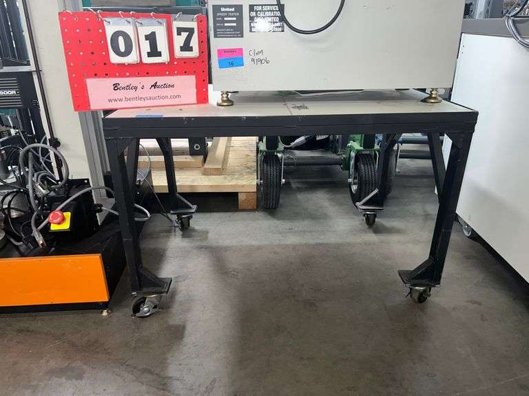 CASTERED WORK TABLE - Bentley & Associates, LLC