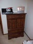 DARK BROWN CHEST OF DRAWERS - Bentley & Associates, LLC