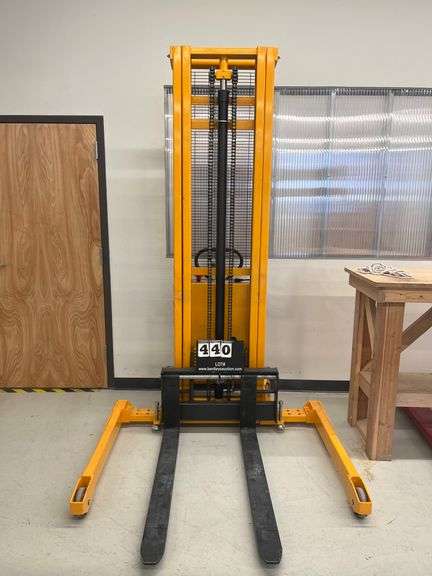 ULINE H-5440 STRADDLE STACKER - Bentley & Associates, LLC