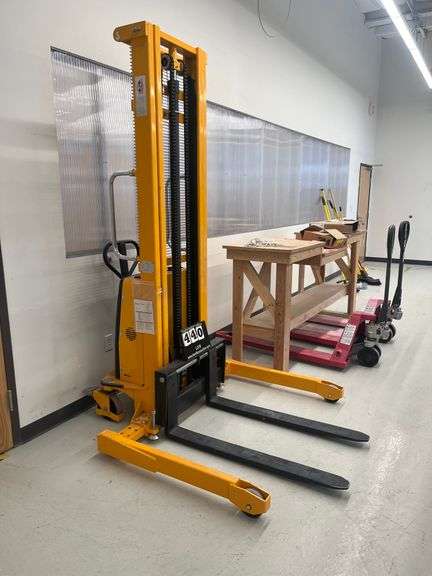 ULINE H-5440 STRADDLE STACKER - Bentley & Associates, LLC