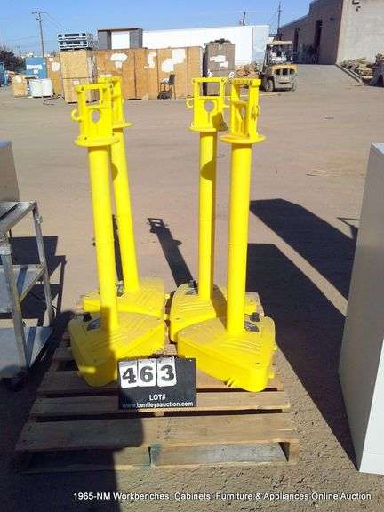 YELLOW CAUTION POLES - HOLDS WATER OF THE BASE - Bentley & Associates, LLC