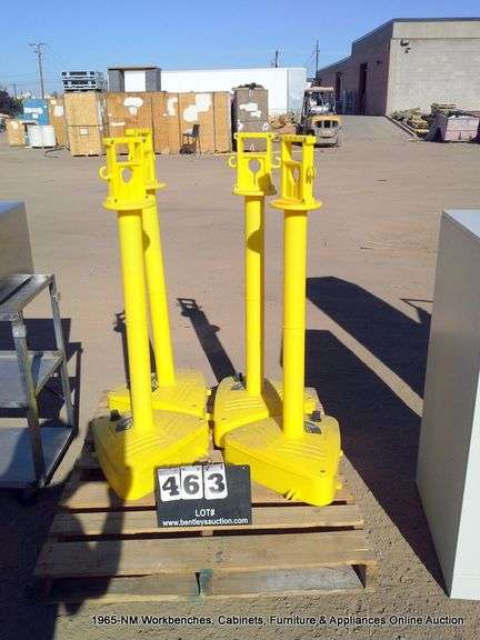 YELLOW CAUTION POLES - HOLDS WATER OF THE BASE - Bentley & Associates, LLC