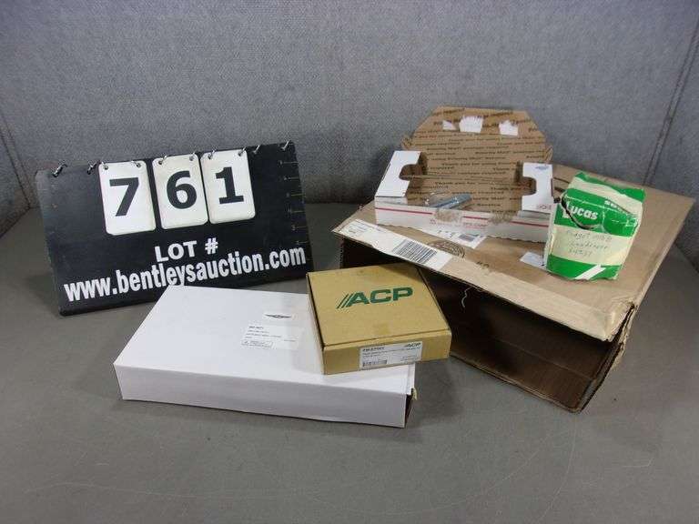 BOX: ASSORTED PARTS, DRILL BIT, ENGINE PART (LAND ROVER), CHROME BEZEL ...